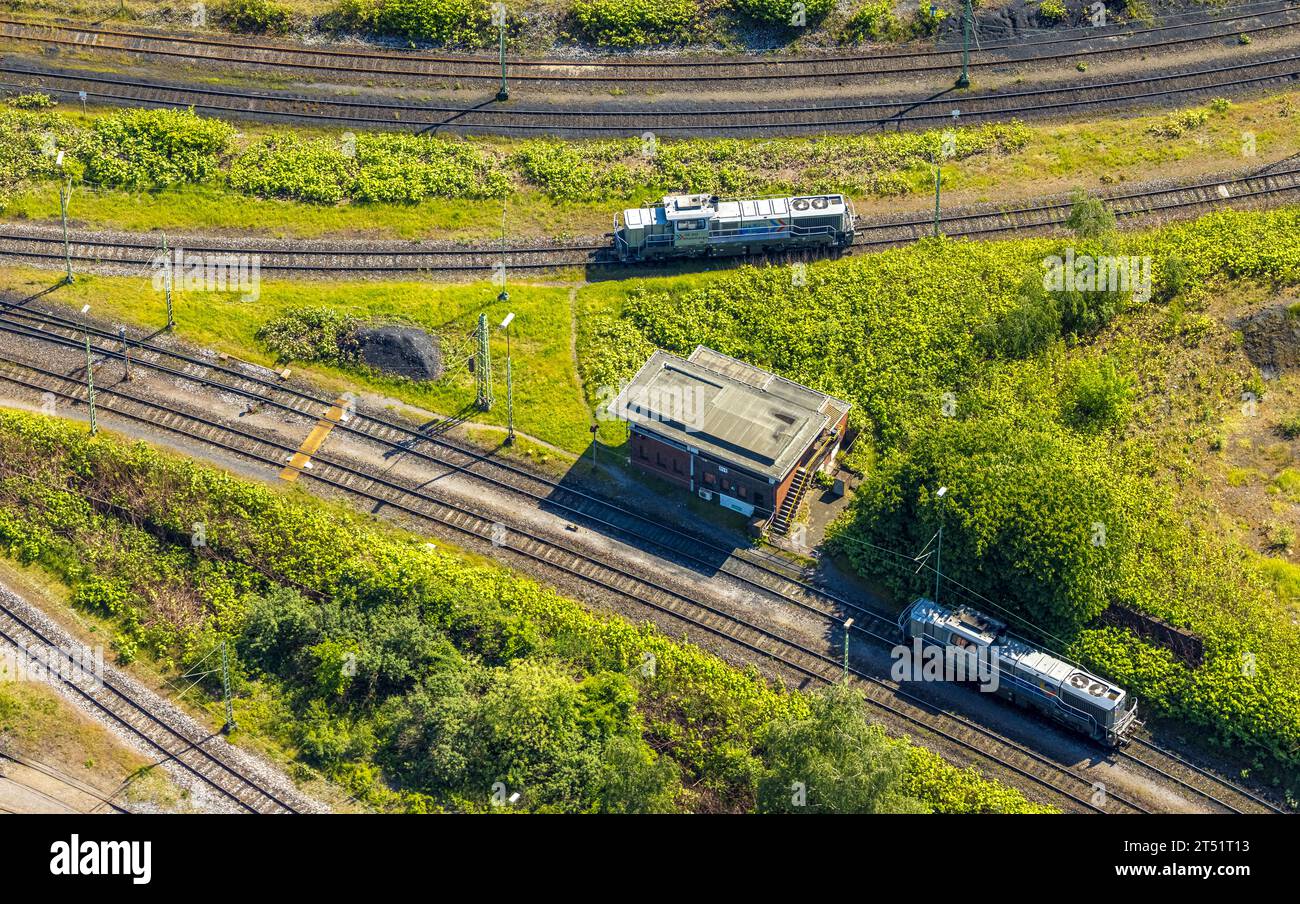 Aerial view, railroad attendant's house and diesel locomotives at ...