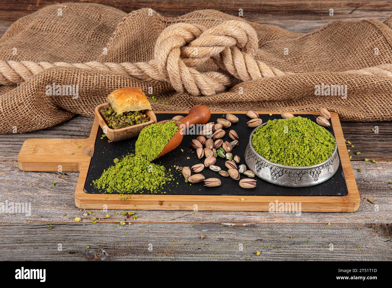 Pistachio powder. Ground, milled, crushed or granulated pistachio pile ...