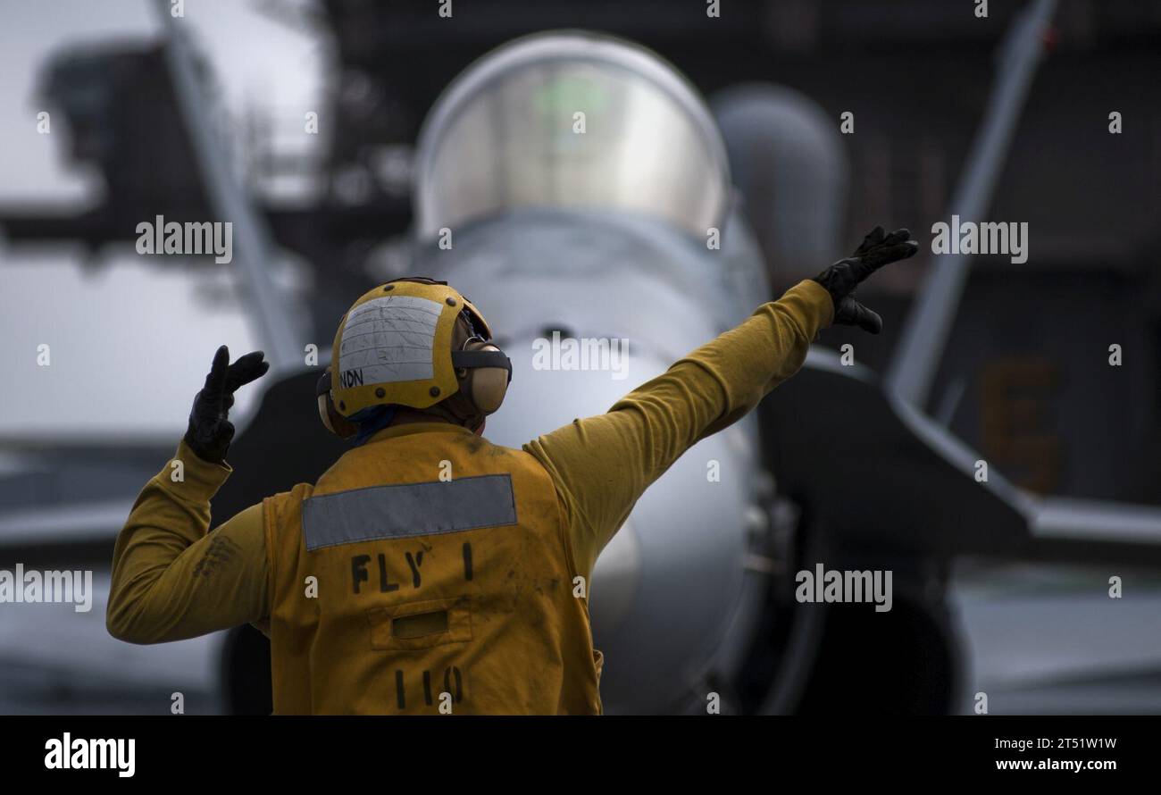 110922TU221-497 PACIFIC OCEAN (Sept. 22, 2011) An aircraft director ...