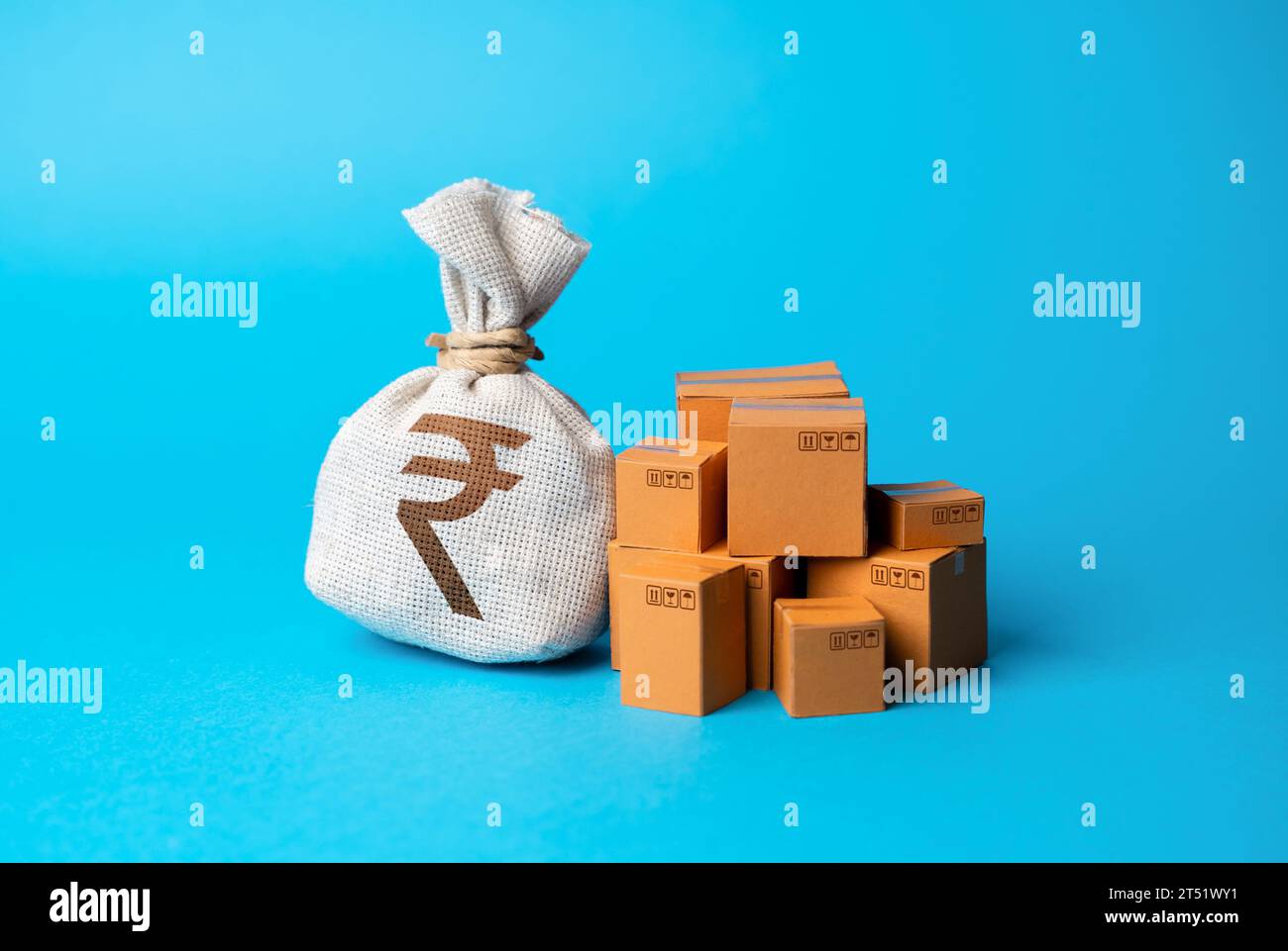 Goods boxes and indian rupee money bag. Budget purchases, large ... Goods boxes and indian rupee money bag. Budget purchases, large ...