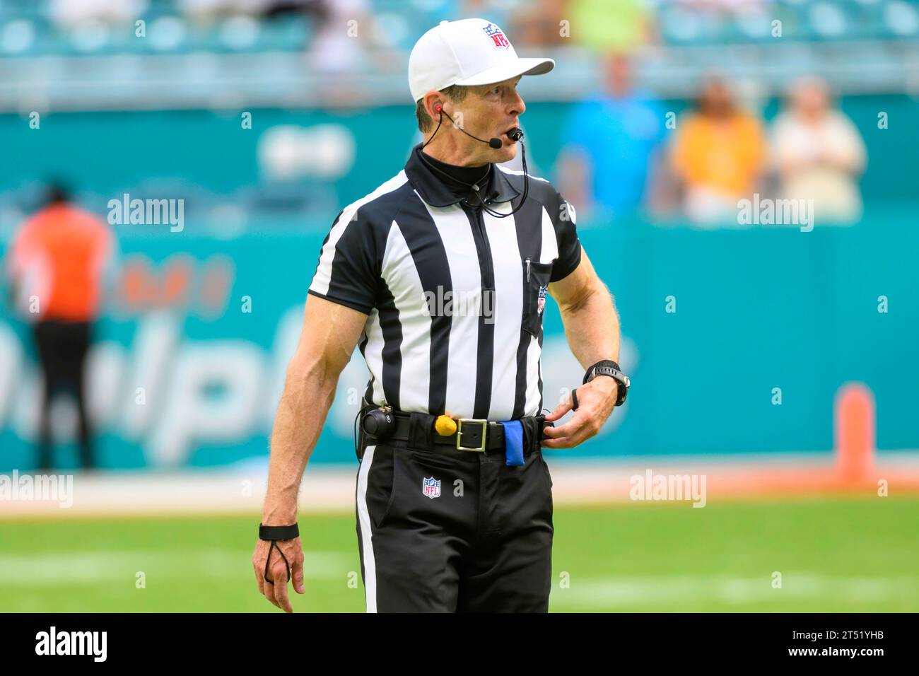 NFL referee Land Clark blows his whistle on the field during an NFL ...