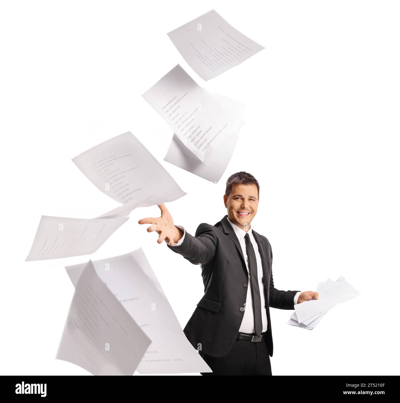 Happy businessman throwing paper in air isolated on white background ...