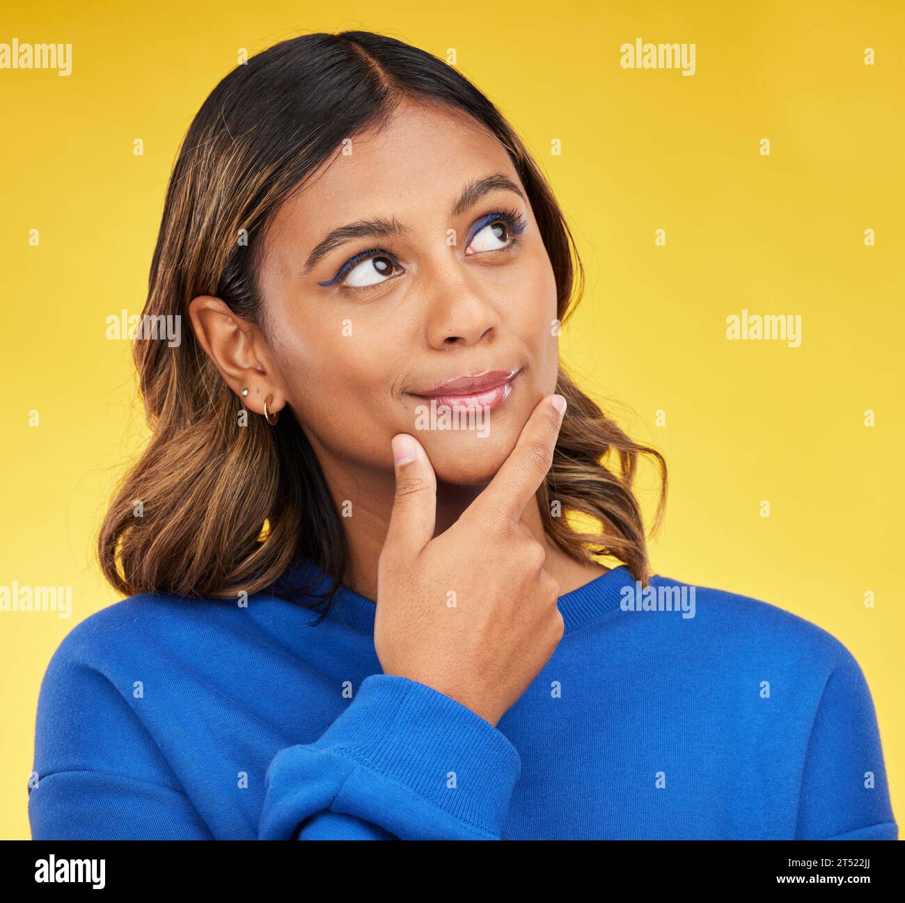 Thinking, idea and young woman in a studio with a dreaming, choice or ...