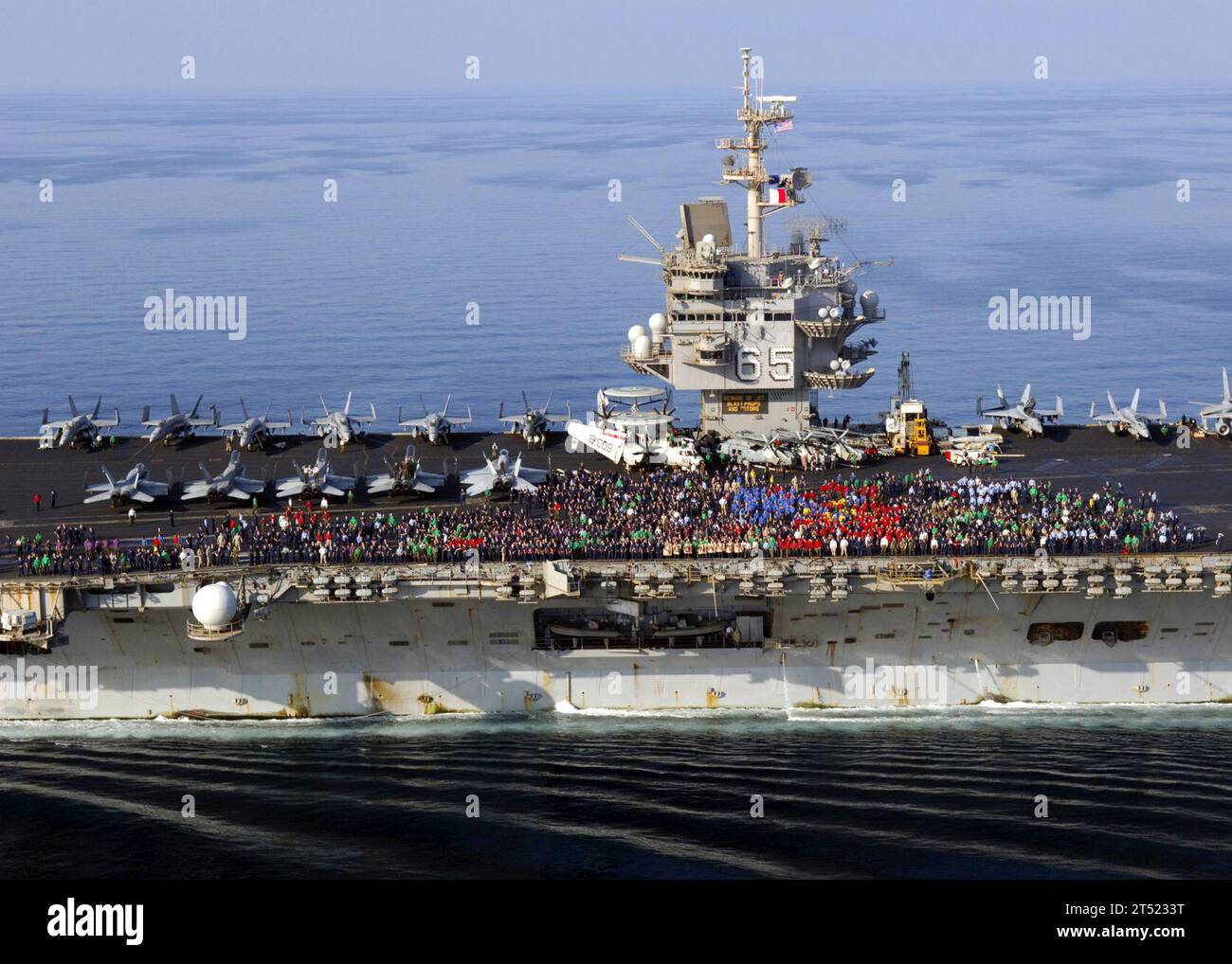 0711156524M-003 ARABIAN SEA (Nov. 15, 2007) Sailors and Marines aboard ...