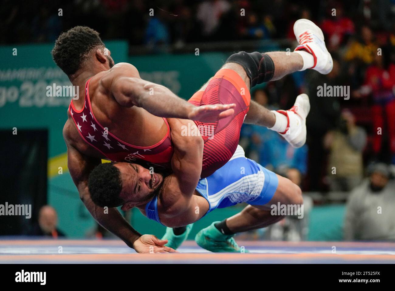 Cuba's Alejandro Valdes, bottom, takes down Nahshon Garret of the ...