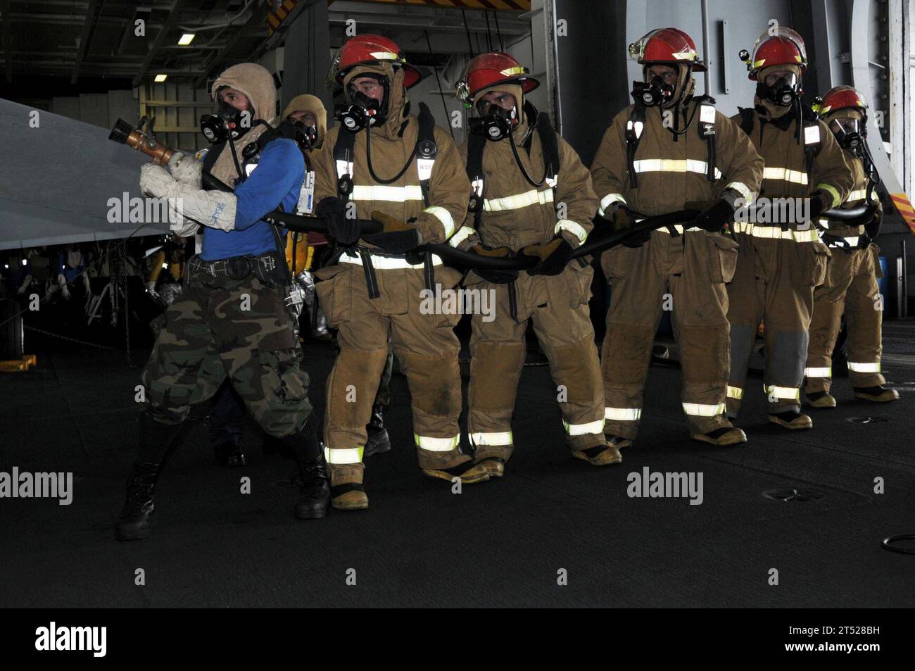 0909143038W-027 BAY OF BENGAL (Sept. 14, 20009) Sailors assigned to the ...