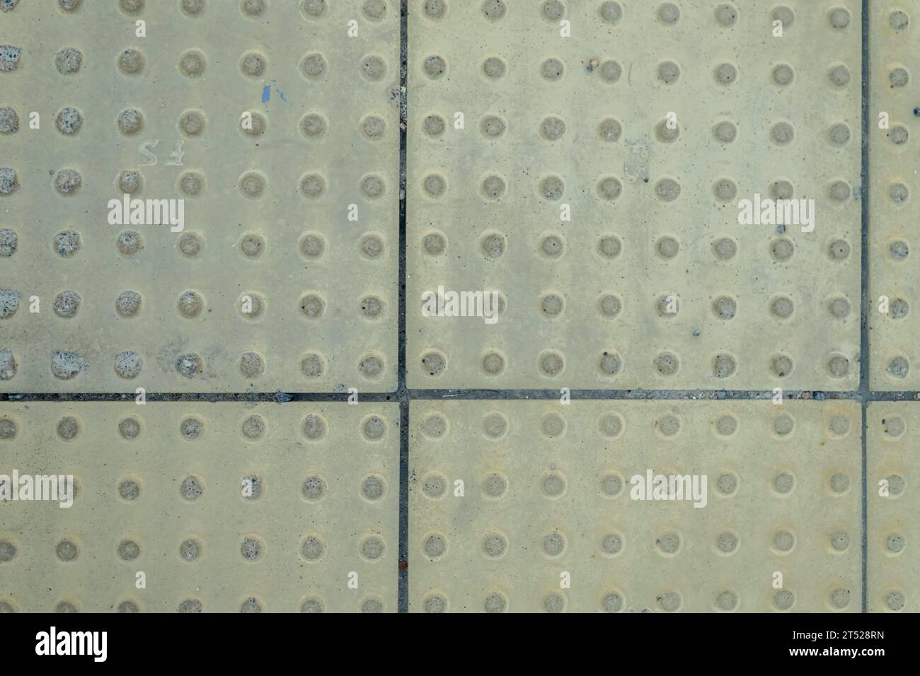 Background texture of yellow tiles for visually impaired and blind ...
