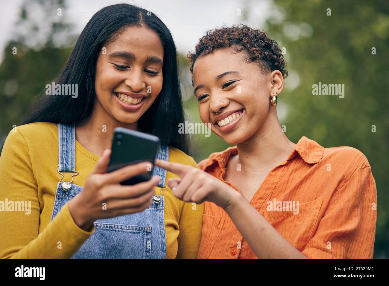 Phone, friends and women online in park with smile together for holiday ...