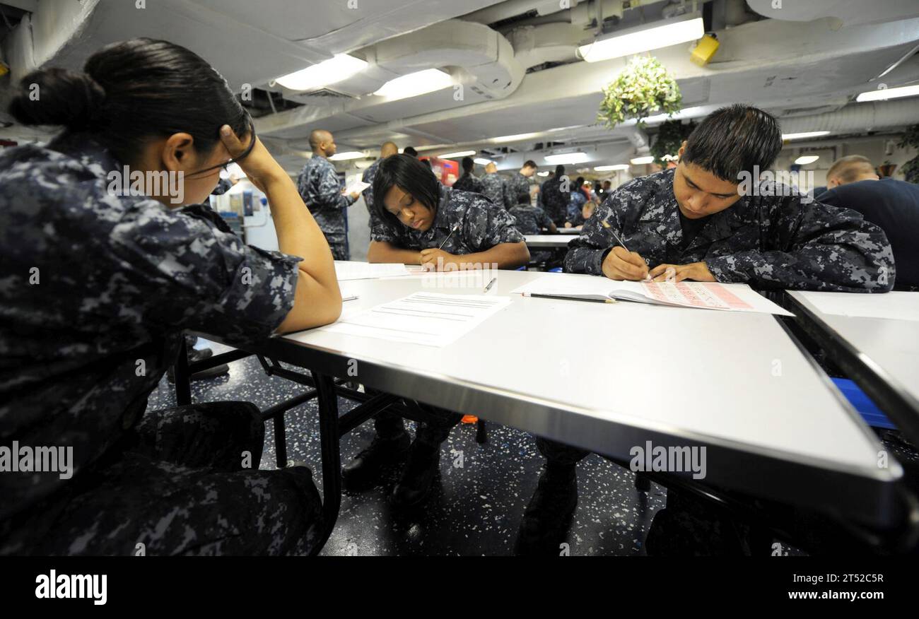 1009164135M-021 ARABIAN SEA (Sept. 16, 2010) Sailors take the E-4 Navy ...