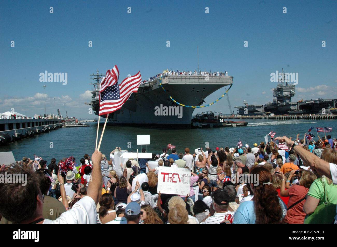 1007289806M-137 NORFOLK (July 28, 2010) Family and friends await the ...