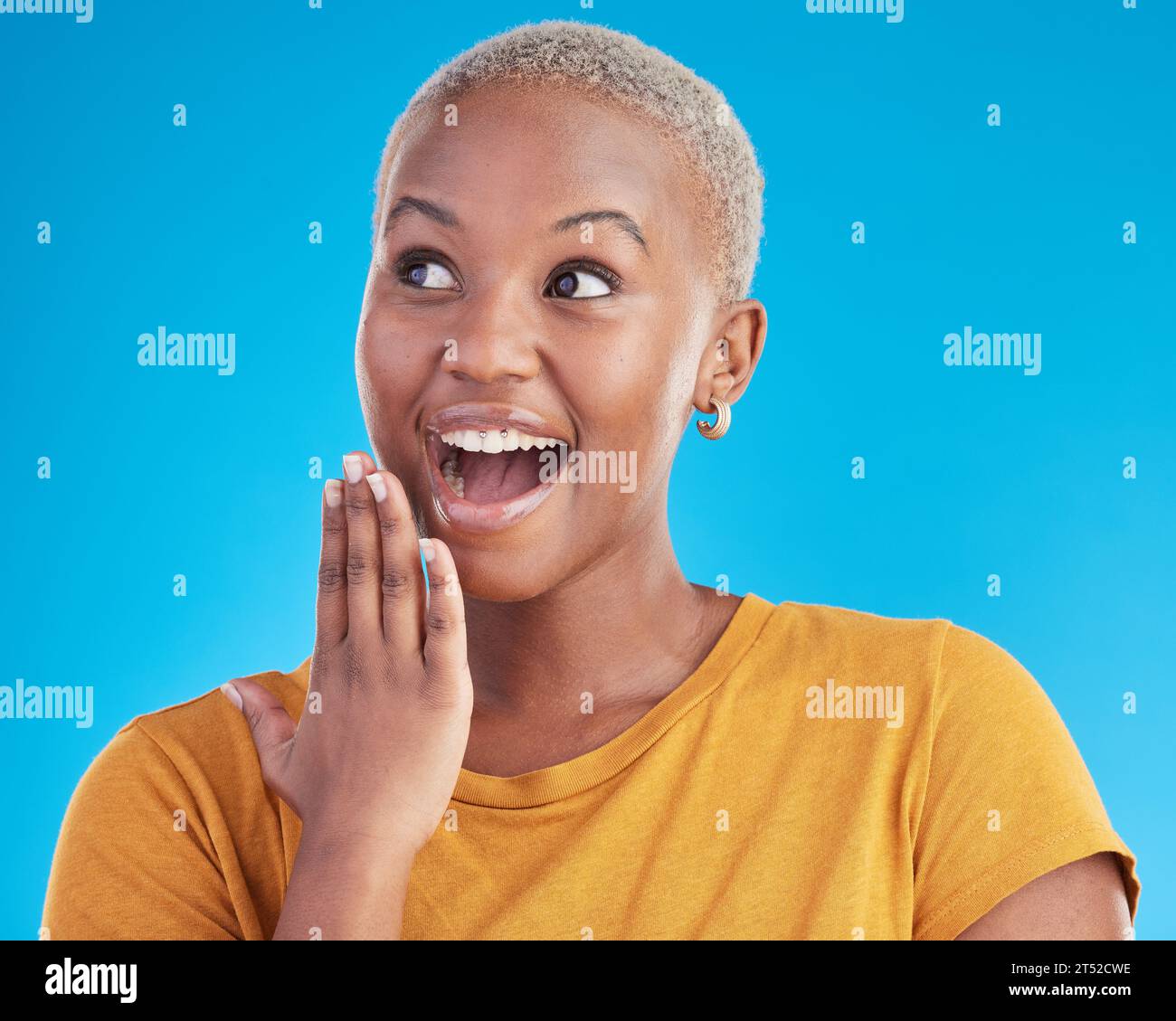 Surprise, thinking or excited black woman in studio for shocking news ...