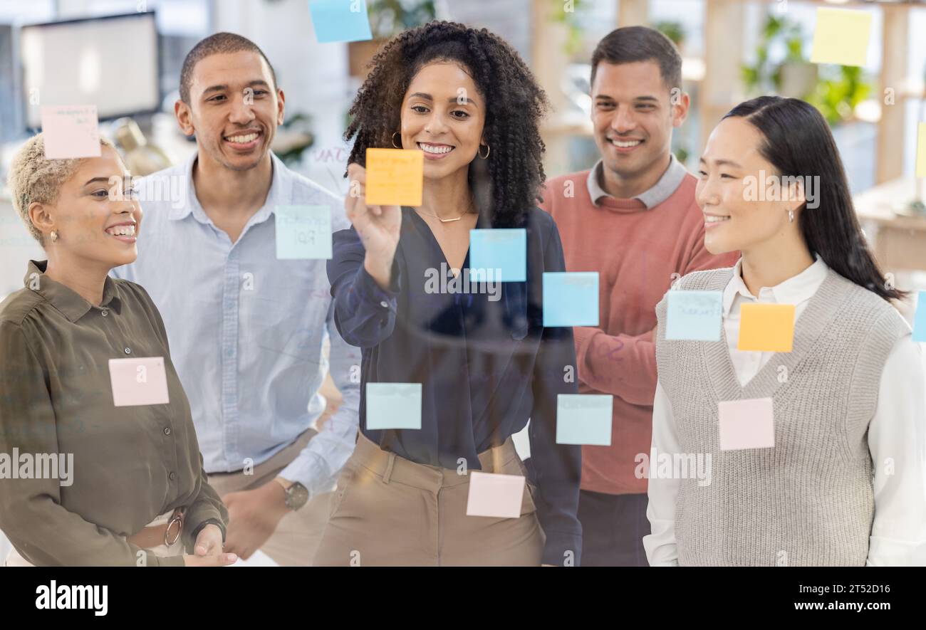 Teamwork, writing and collaboration by business people in meeting for ...