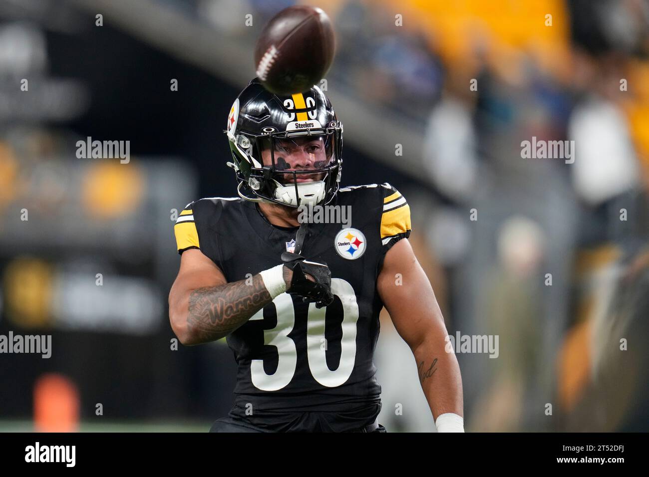 Pittsburgh Steelers running back Jaylen Warren warms up for the team's ...