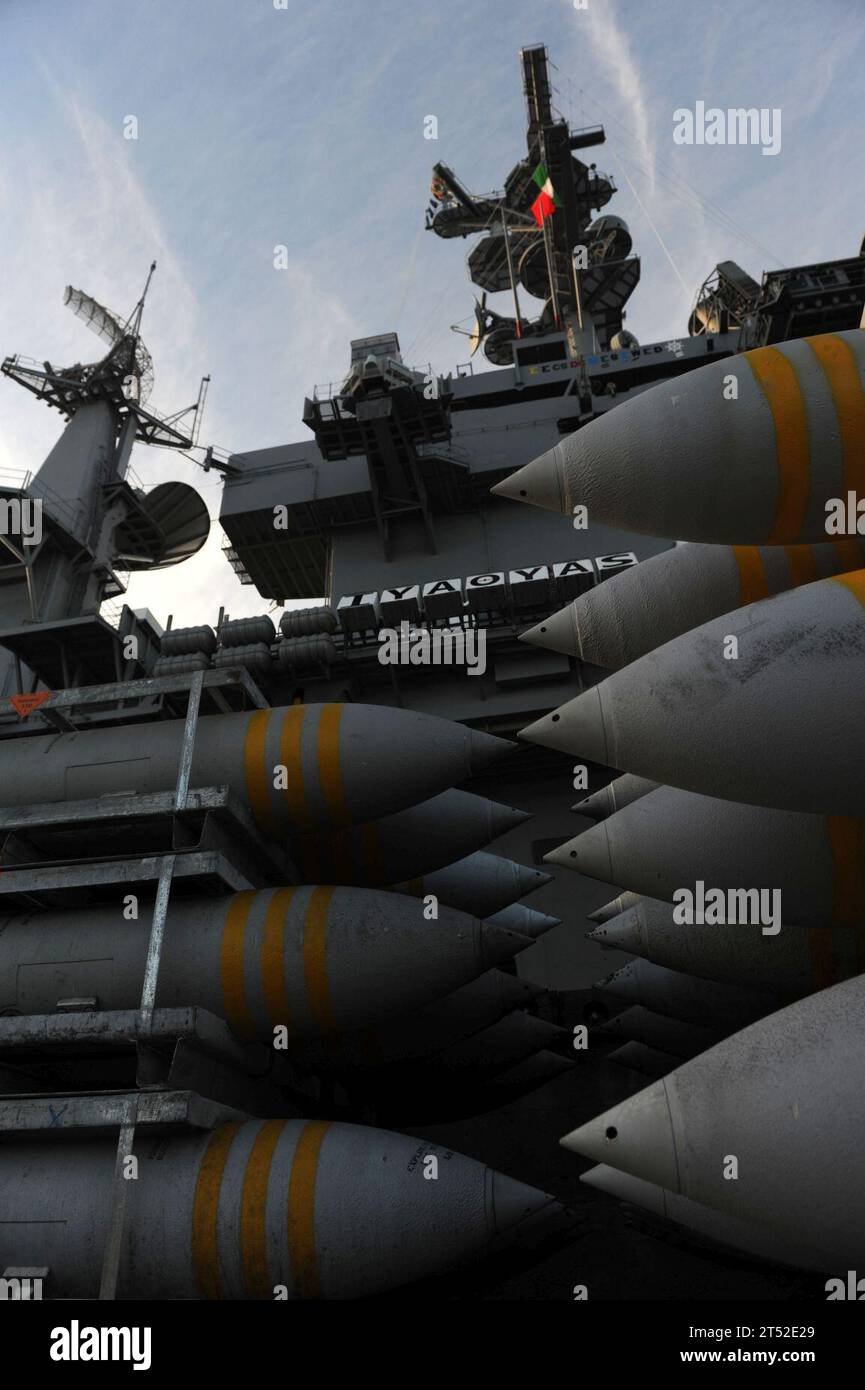 1012172475A-261 INDIAN ISLAND, Wash. (Dec. 17, 2010) Stacked ordnance ...