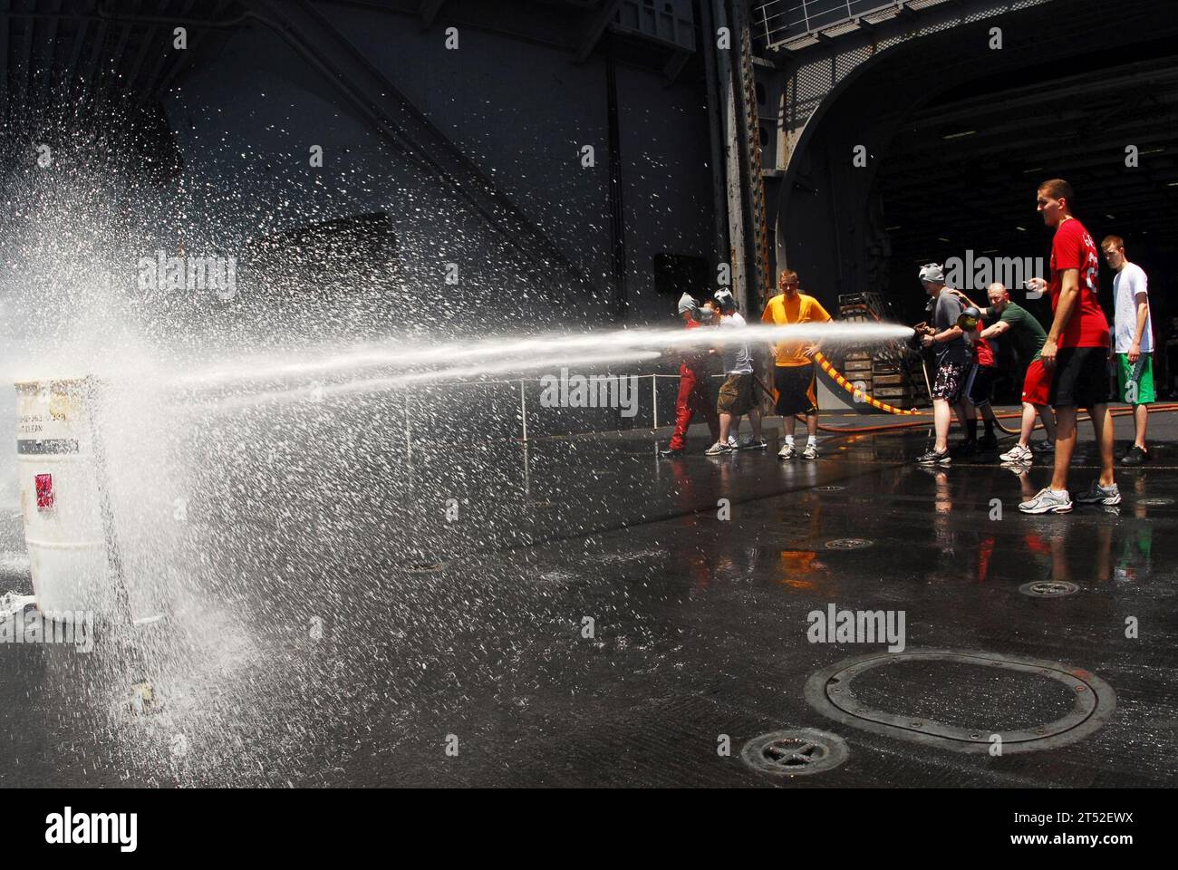 0704189928E-022 ARABIAN SEA (April 18, 2007) - Sailors man a fire hose ...