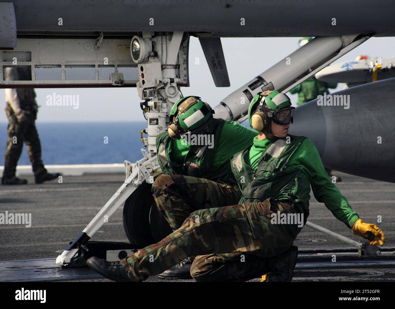 0809097241L-007 ATLANTIC OCEAN (Sept. 9, 2008) Flight deck personnel ...