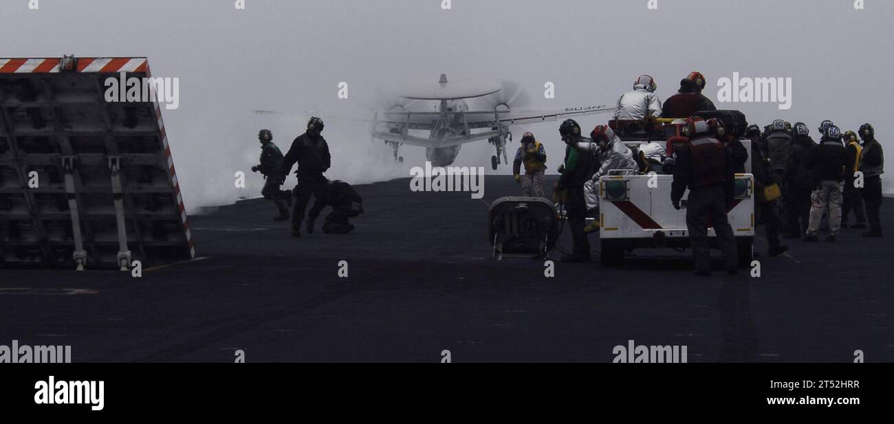 0907036538W-013 PACIFIC OCEAN (July 3, 2009) Sailors prepare the bow ...