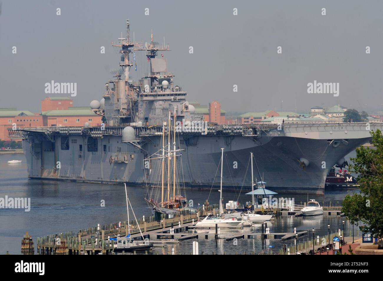 110720DY265-074 NORFOLK (July 22, 2011) Tugboats position the ...