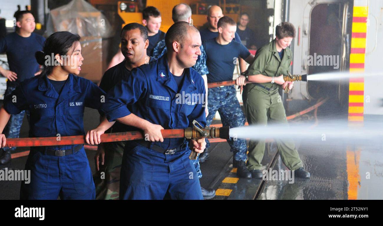 Fire hose handling techniques hi-res stock photography and images - Alamy