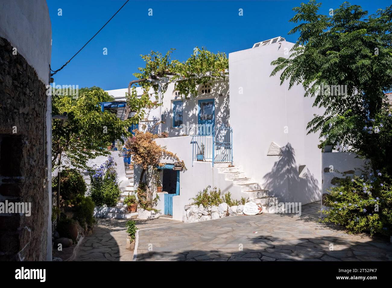 Traditional whitewashed houses in Volax, Tinos, Greece, showcasing the ...