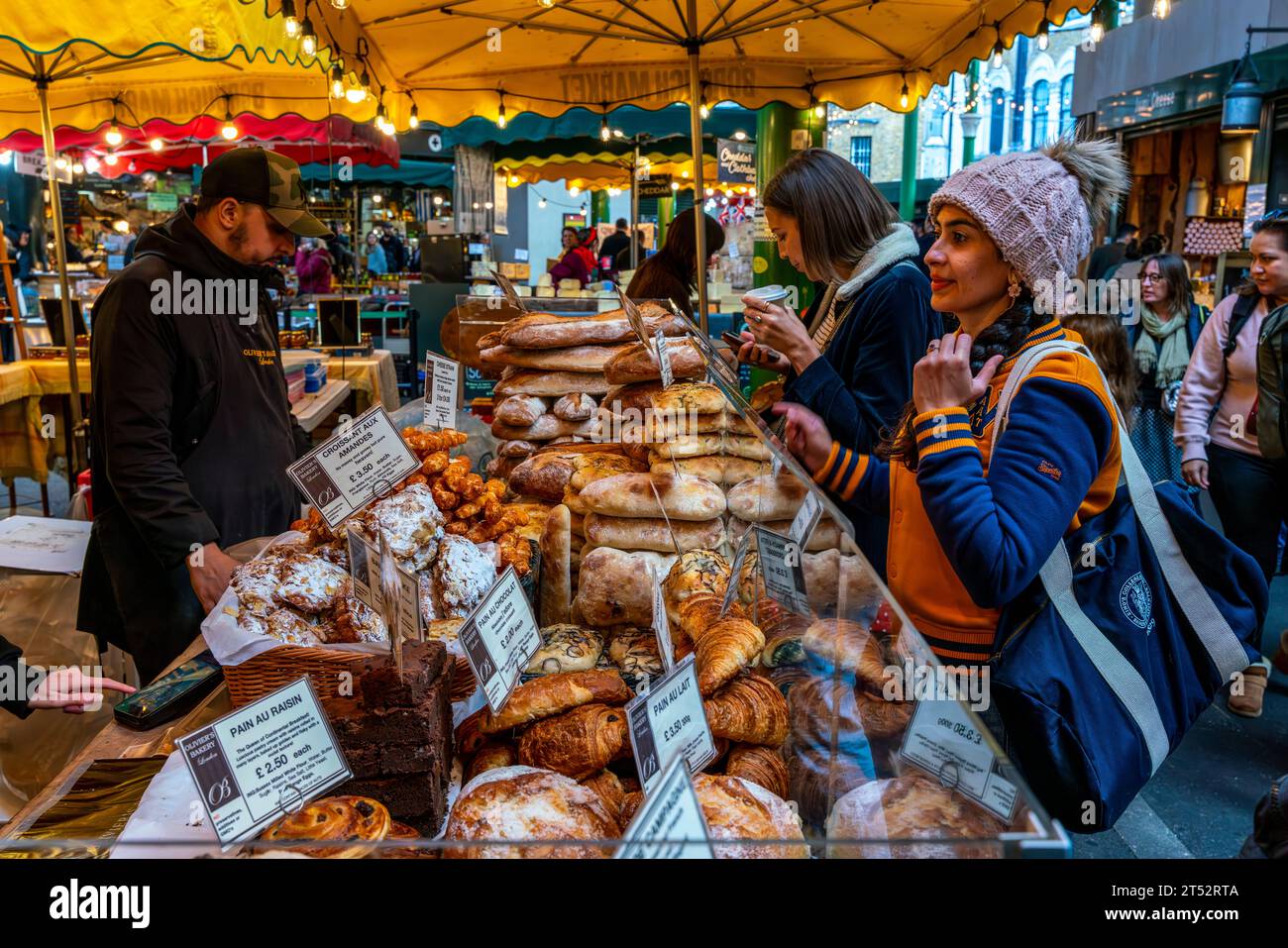 Young People Buying Bread From Olivier's Bakery, Borough Market, London ...