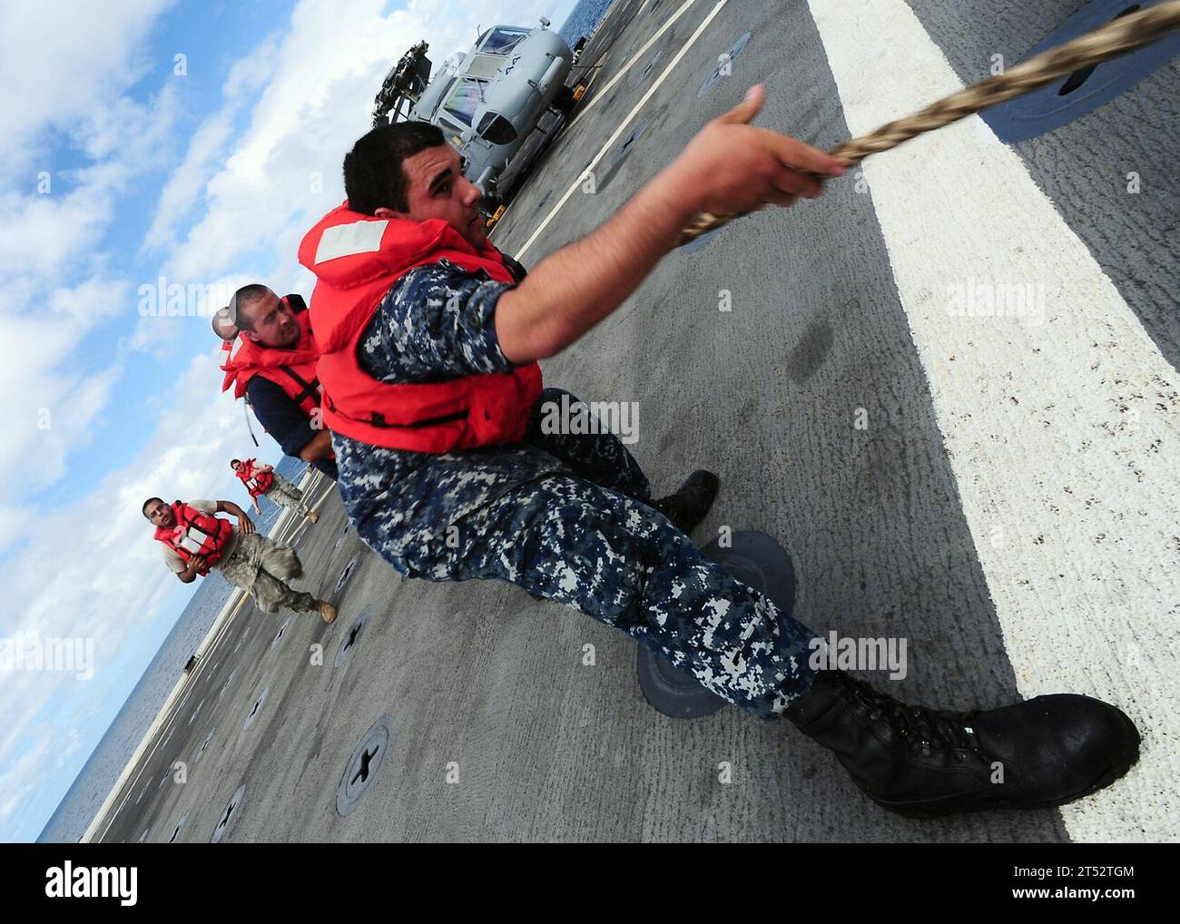 110627HS649-479 PACIFIC OCEAN (June 27, 2011) Sailors perform a line ...