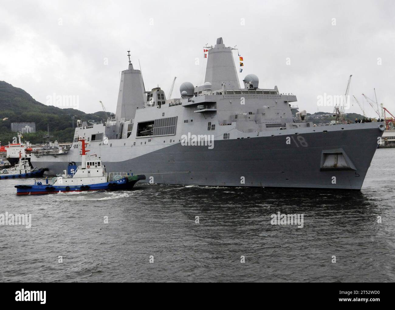 0907080807W-137 SASEBO, Japan (July 7, 2009) Tugboats guide the ...