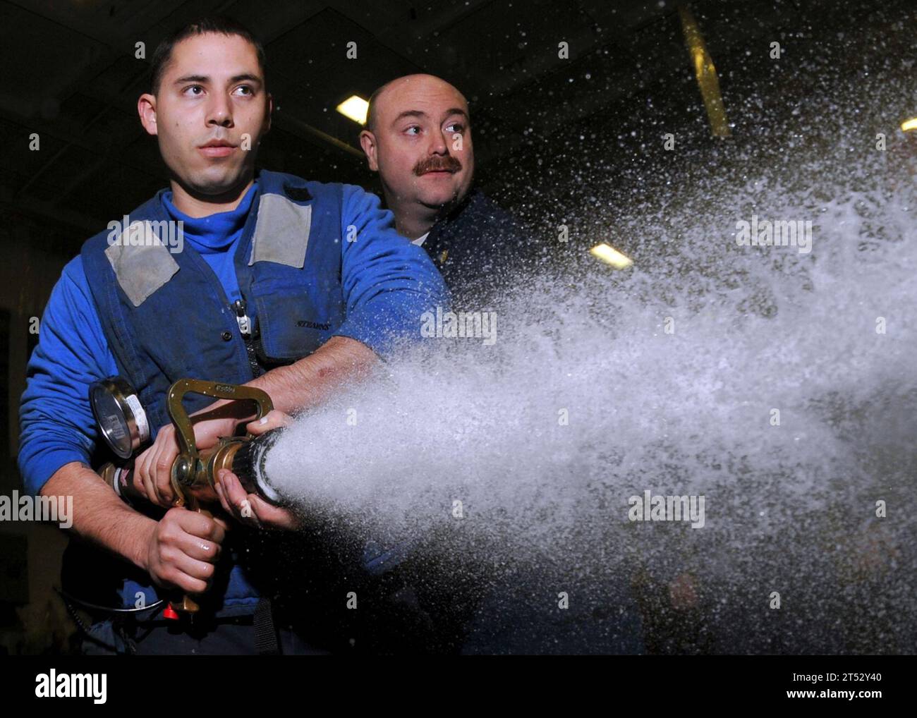 Aqueous Film Forming Foam (AFFF), fire hose team, HANGAR BAY, Pacific ...