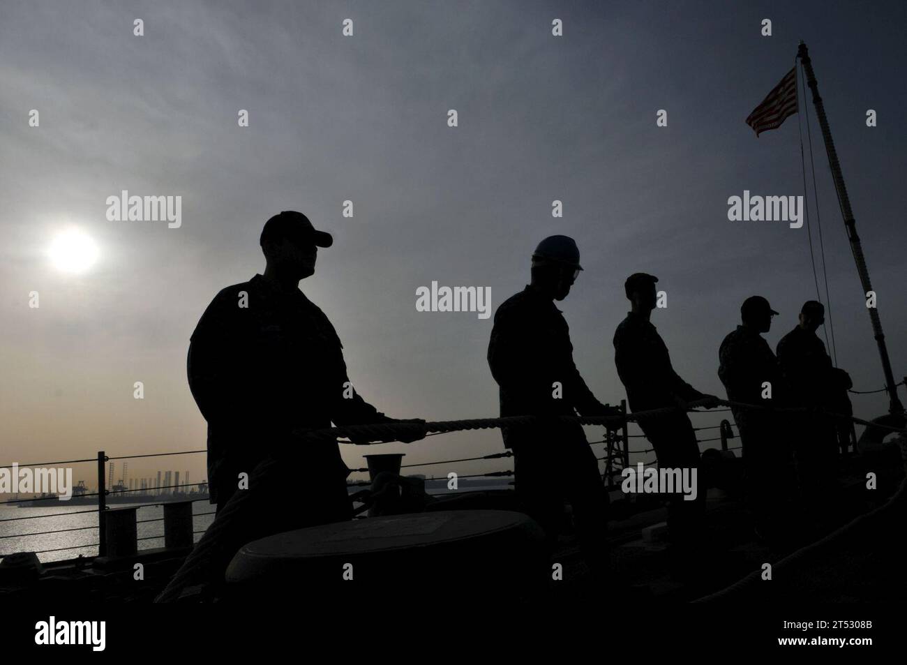 1103099818V-188 MINA SALMAN, Bahrain (March 9, 2011) Sailors man a line ...