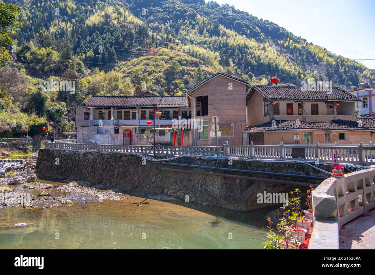 The small river in front of Fujian earthern buildings (also known as ...