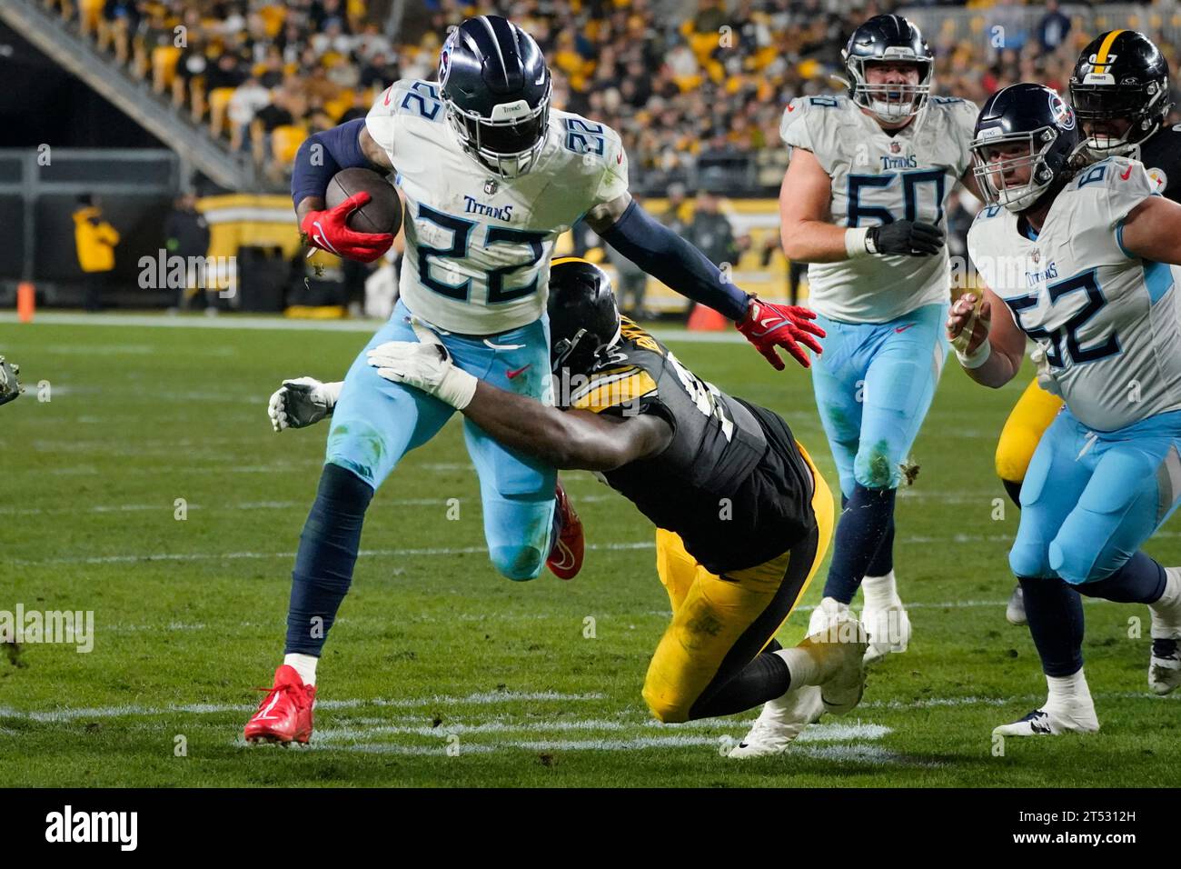 Tennessee Titans running back Derrick Henry (22) is tackled by ...