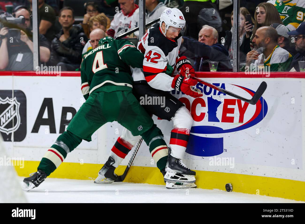 New Jersey Devils center Curtis Lazar, right, and Minnesota Wild ...