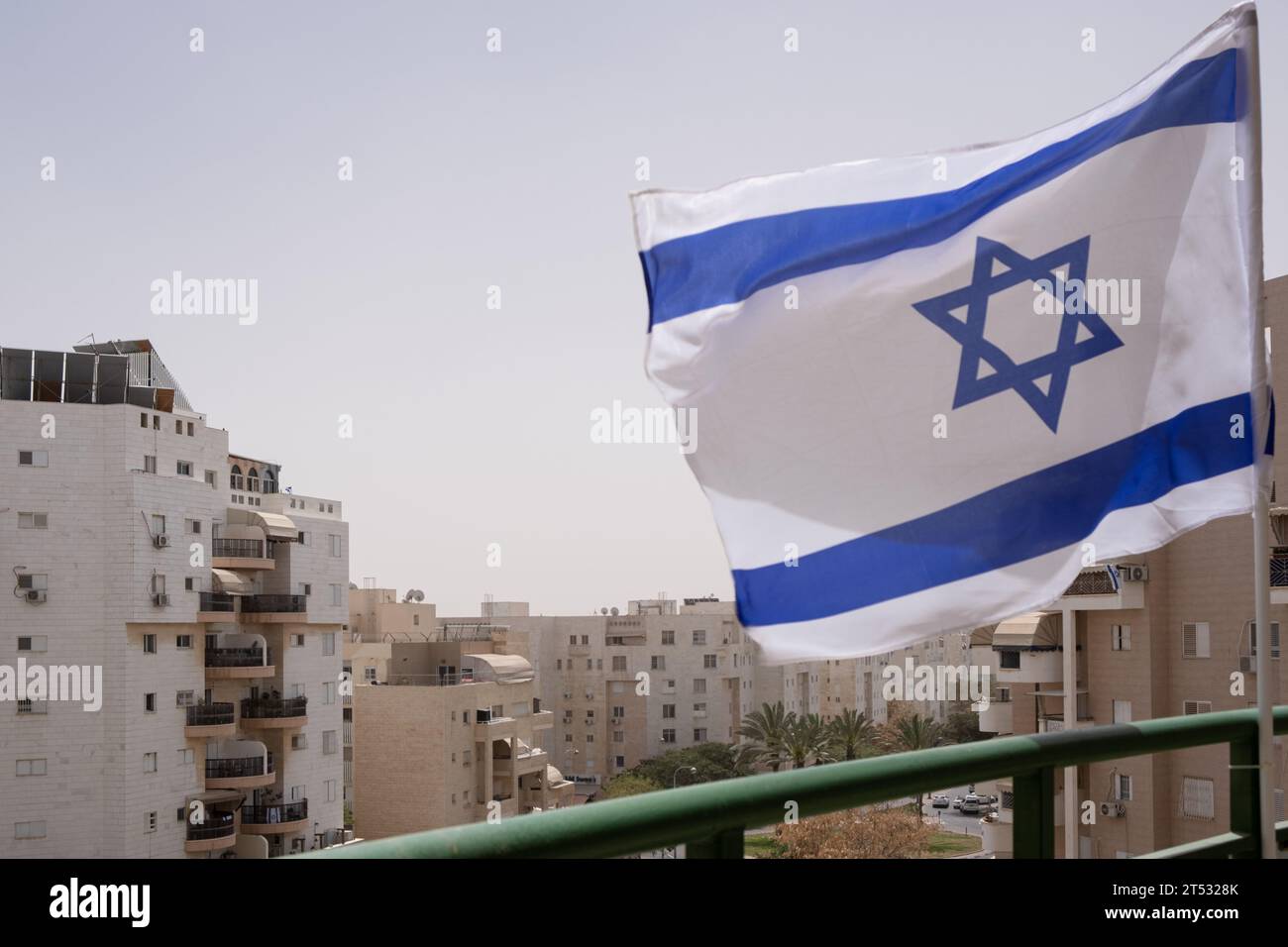 flag of the State of Israel is proudly raised on Independence Day (Yom ...