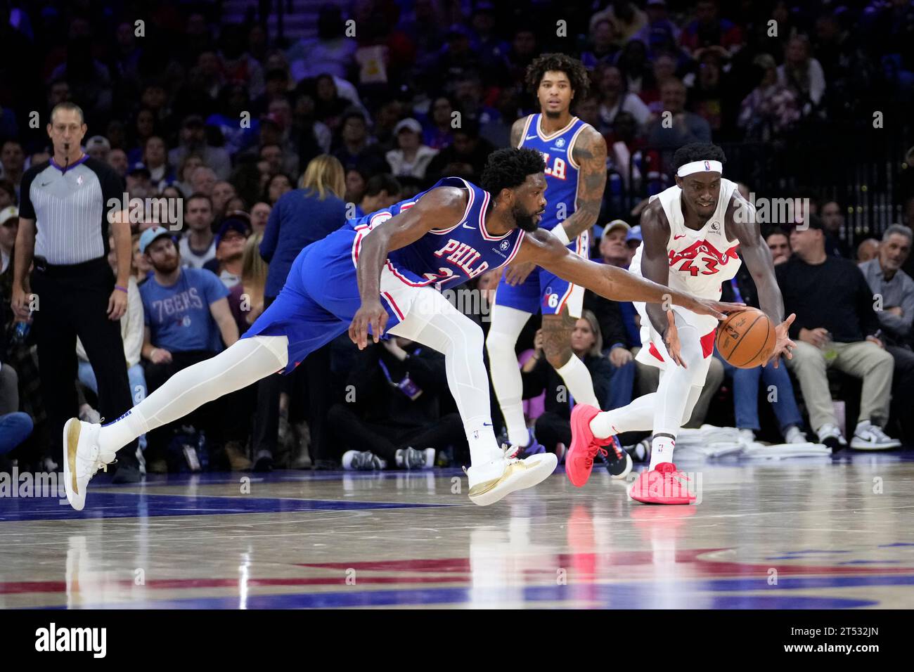 Philadelphia 76ers' Joel Embiid, left, and Toronto Raptors' Pascal ...