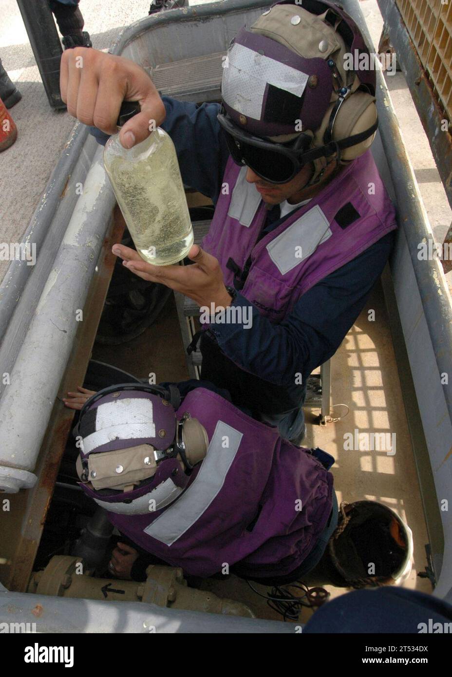 aviation, fuel, fuels, people, purple shirt Stock Photo - Alamy