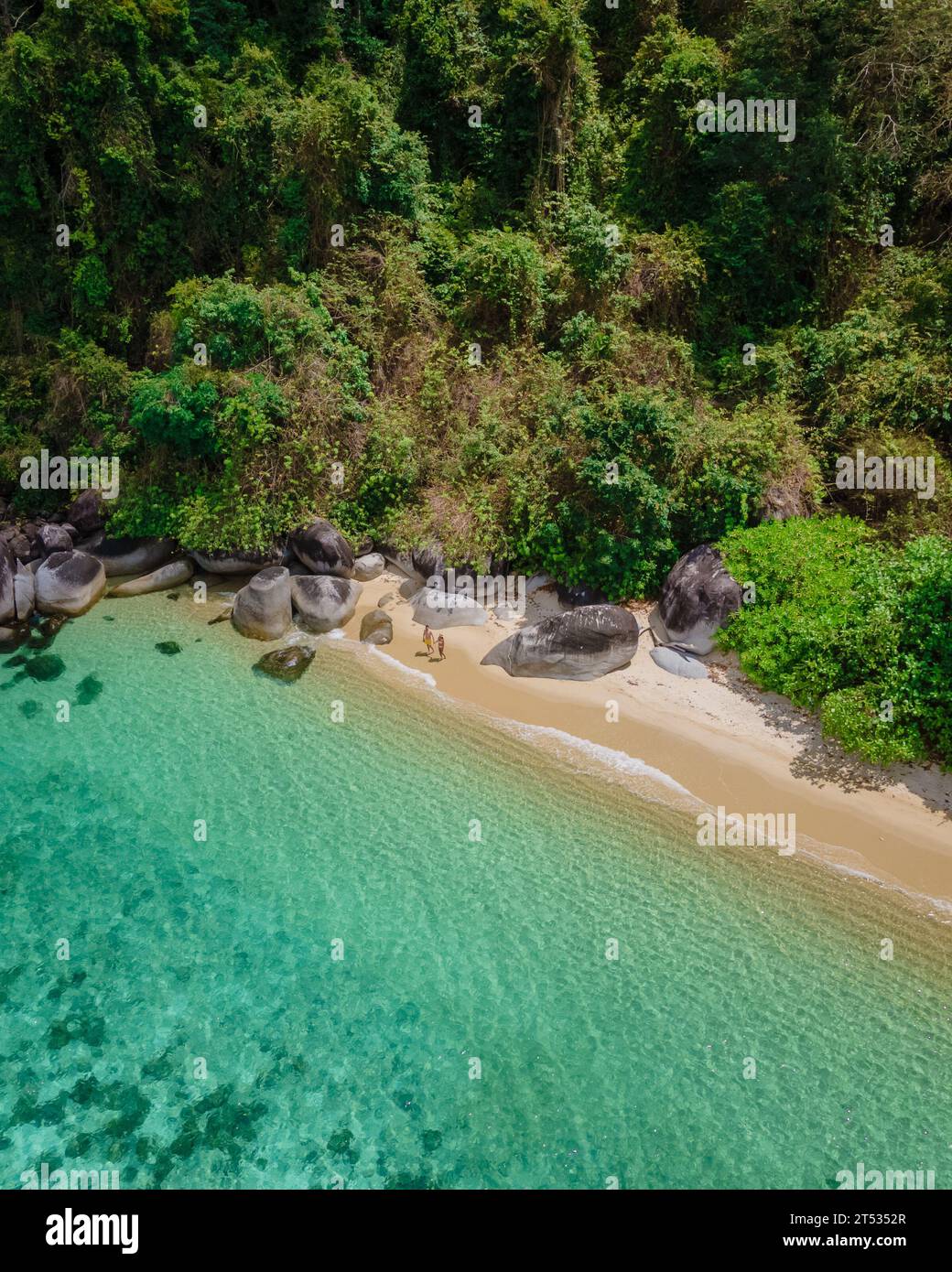 couple on the beach of Ko Adang Island in front of Koh Lipe Island ...