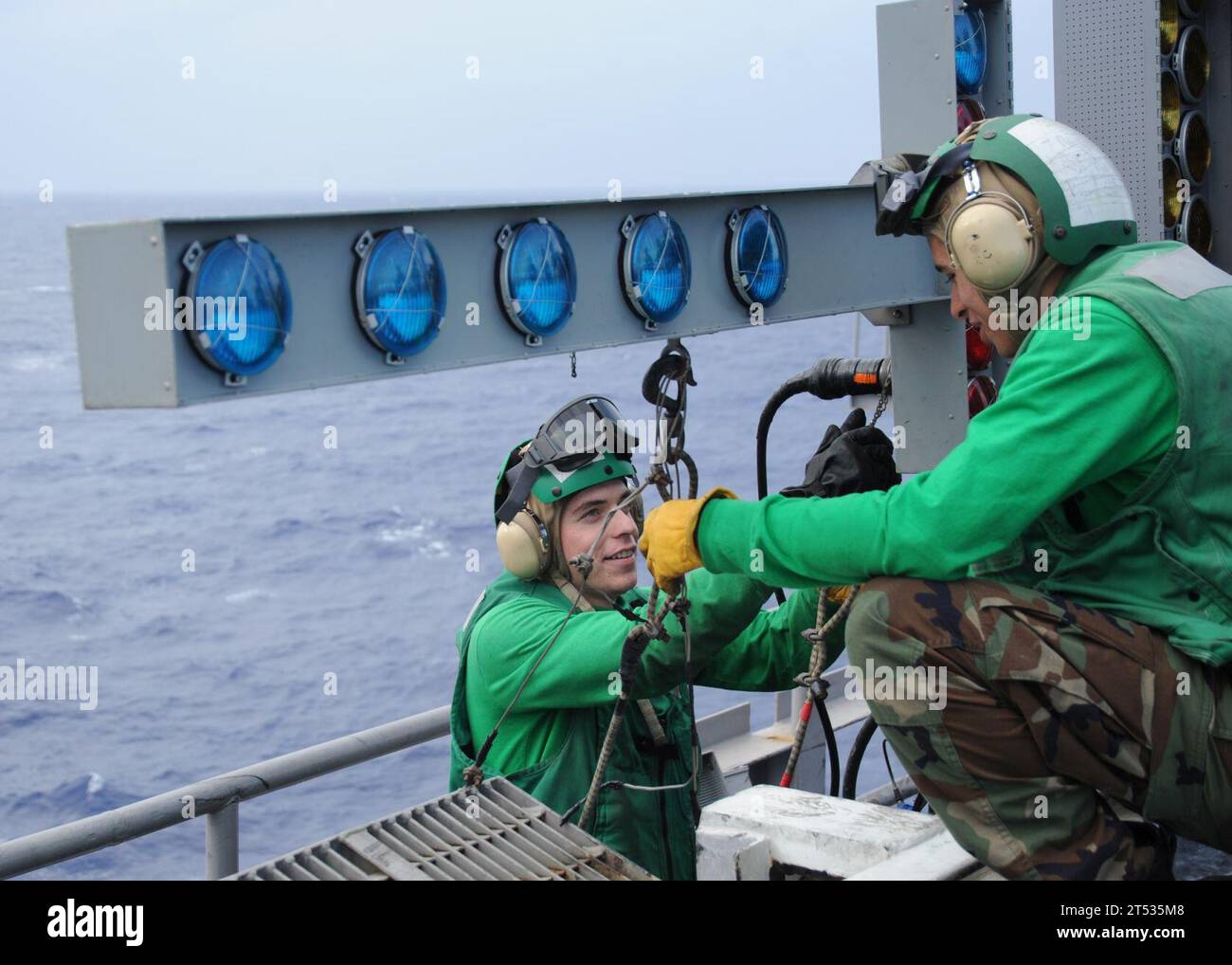 barricade drill, CVN 73, flight deck, Forward Deployed, GW, MOVLAS, Pacific Ocean, Sailors, U.S ...