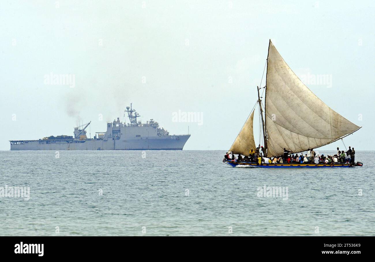 1001195345W-110 BONEL, Haiti (Jan. 19, 2010) A Haitian boat sails off ...