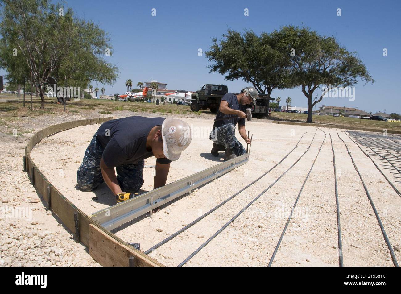 110908LY958-049 CORPUS CHRISTI, Texas (Sept. 8, 2011) Seabees lay a ...