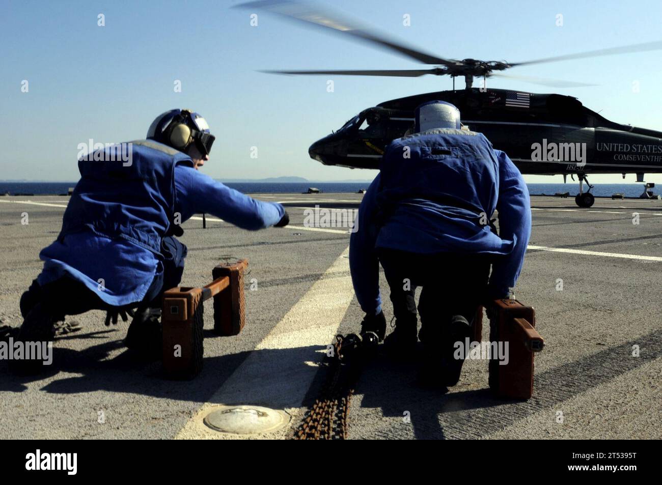 blue shirt, chock and chain, flight deck, Flight Quarters, Pacific ...