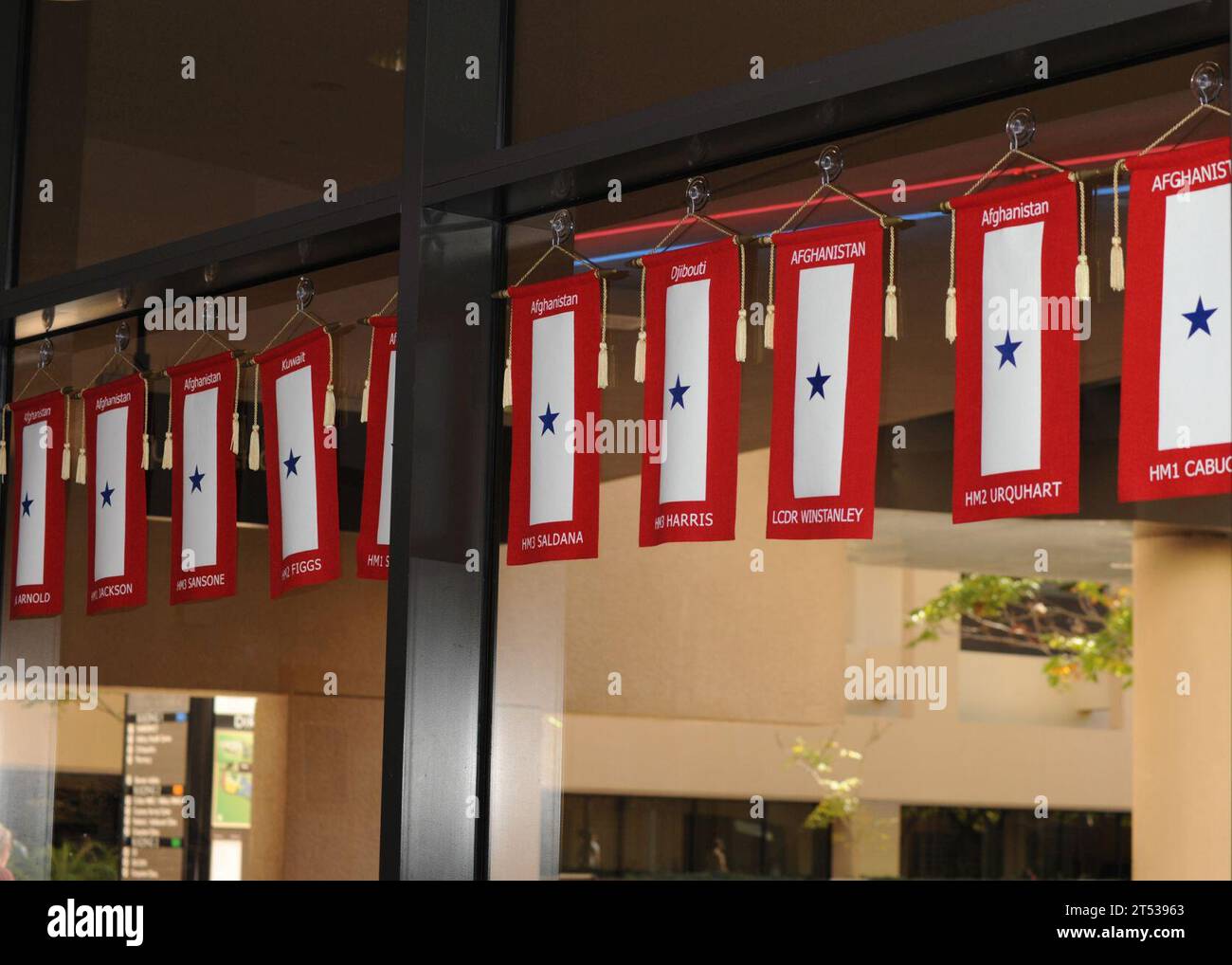 1011125586R-006 SAN DIEGO (Nov. 12, 2010) Blue star flags hang in the ...