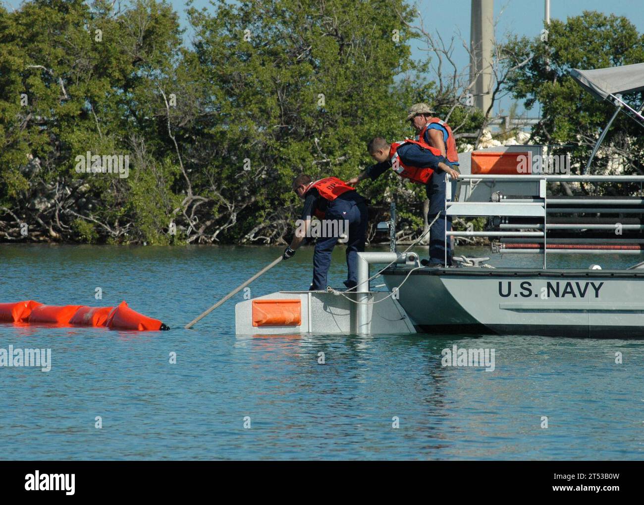 Boom, Sailor, U.S. Navy, utility boats Stock Photo - Alamy