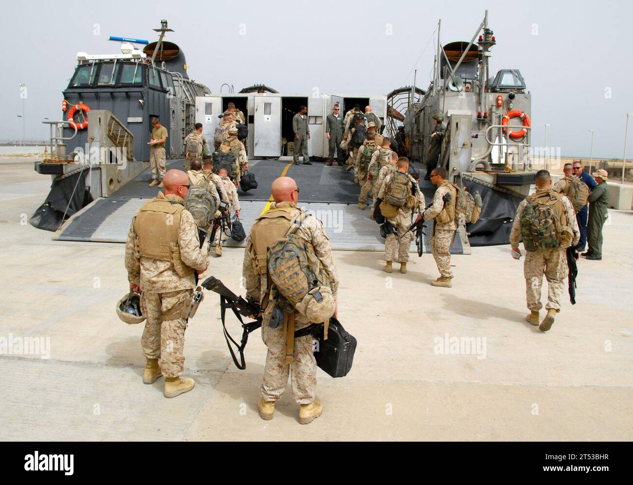 Boxer Expeditionary Strike Group, Marines boarding landing craft ...