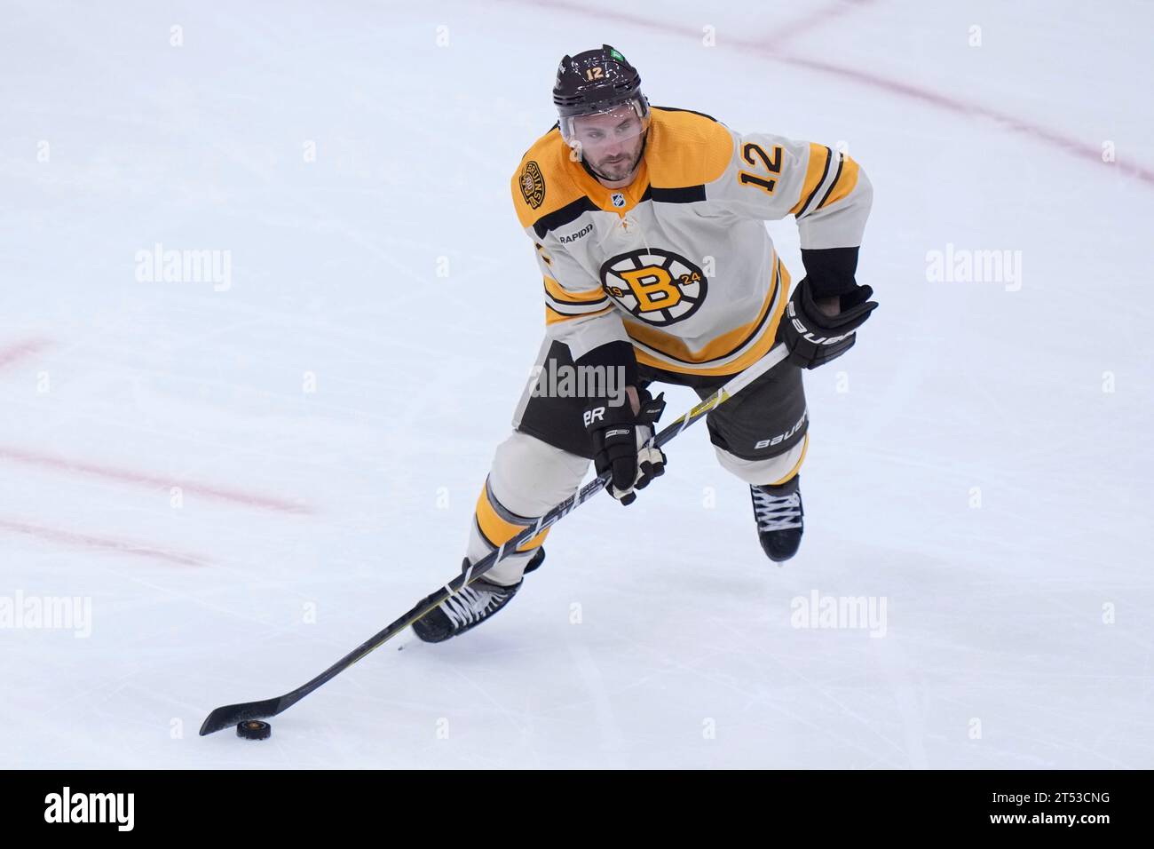 Boston Bruins defenseman Kevin Shattenkirk (12) skates during the first ...