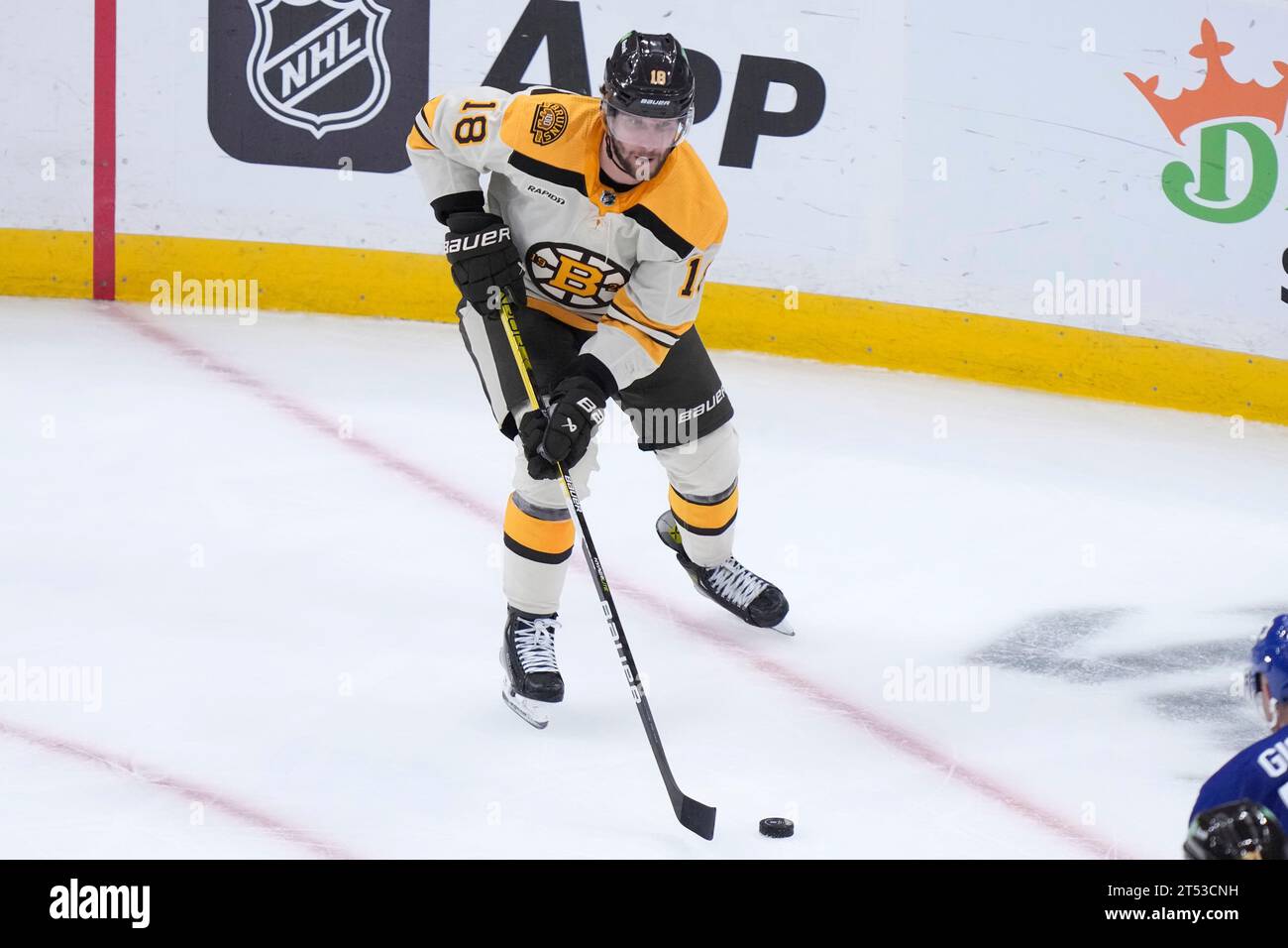 Boston Bruins center Pavel Zacha (18) skates in the third period of an ...