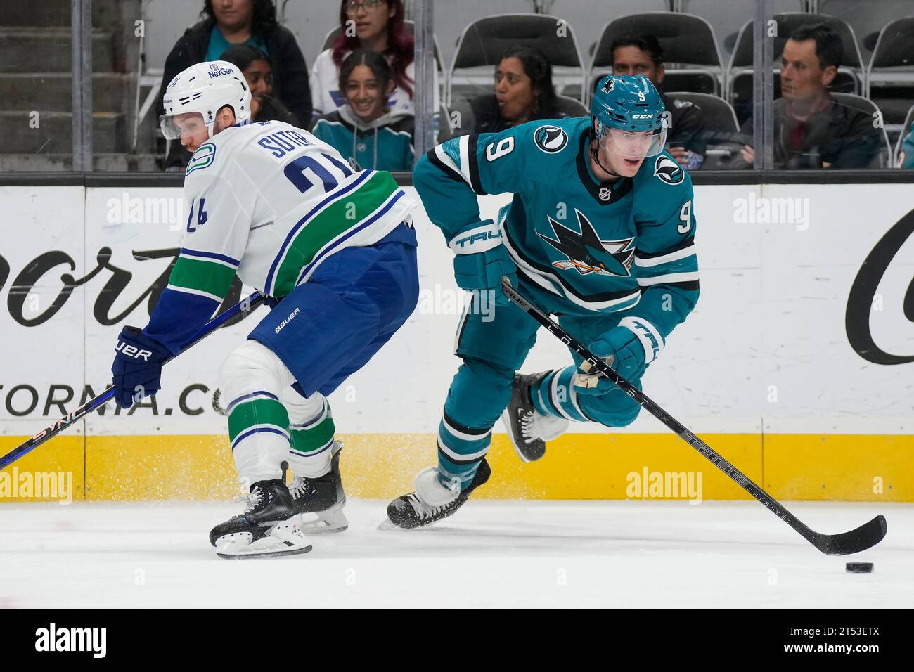 San Jose Sharks defenseman Jacob MacDonald (9) skates with the puck ...