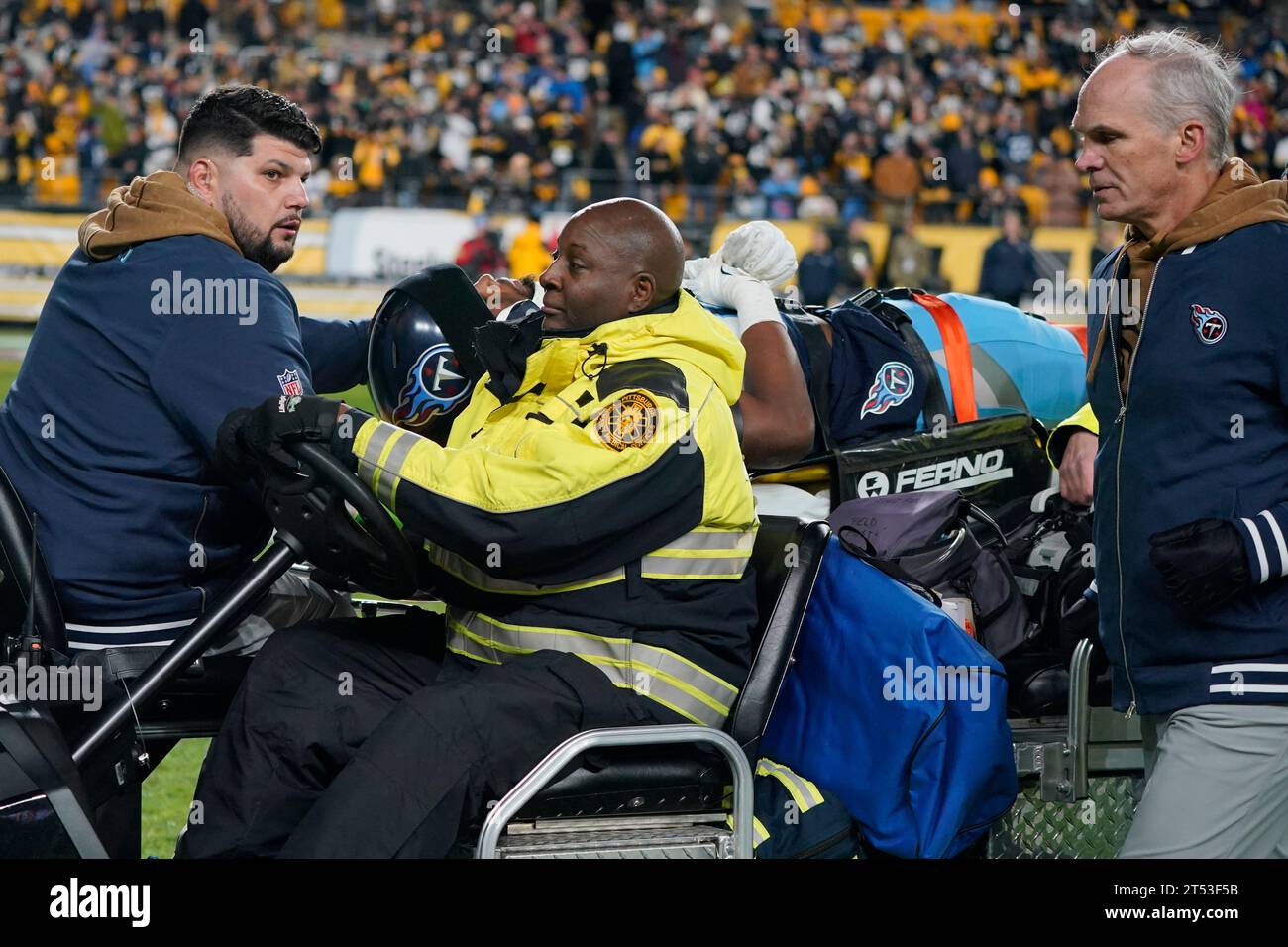 Tennessee Titans wide receiver Treylon Burks is carted off the field ...