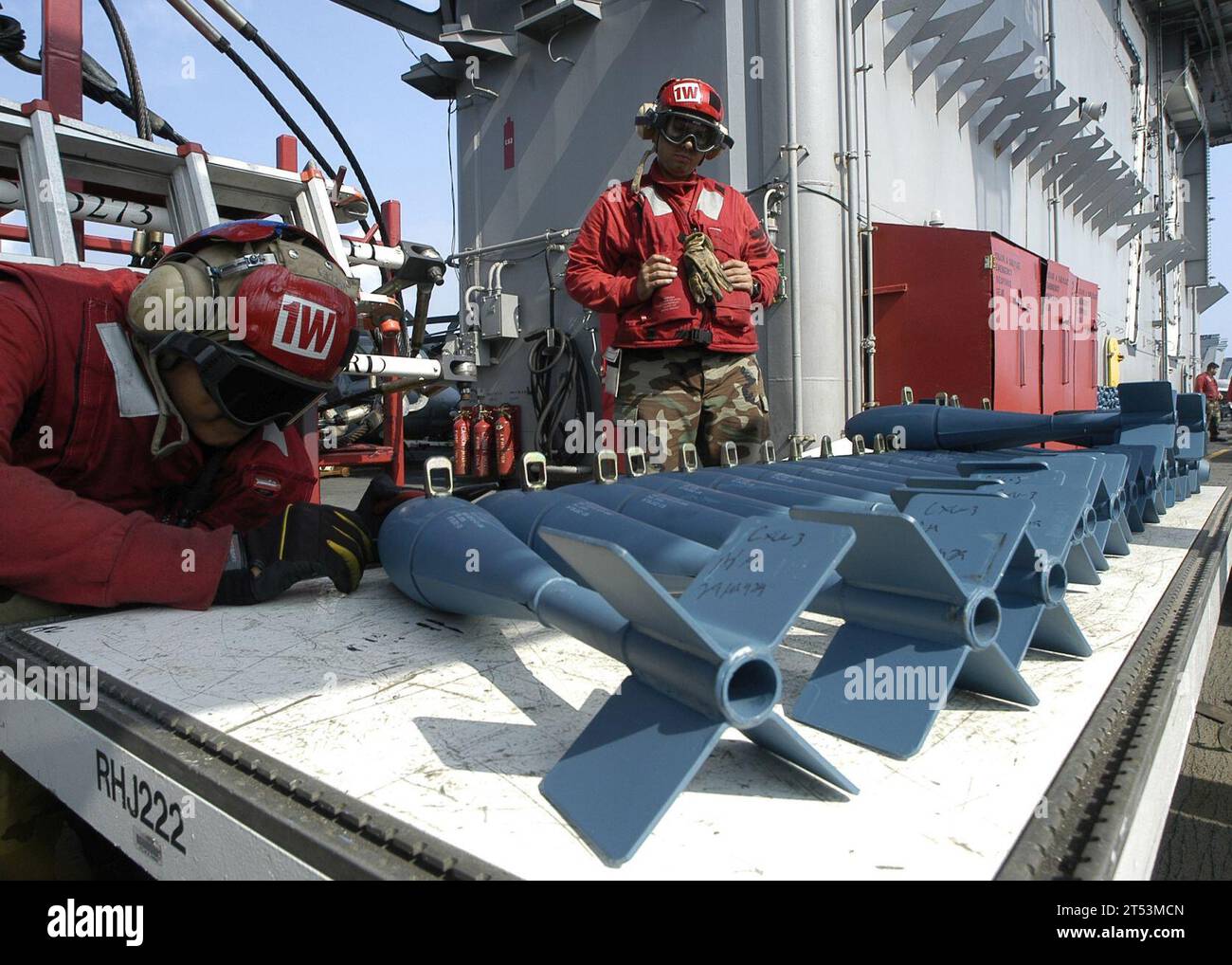 Carrier, people, Red Shirt, Wepons Stock Photo - Alamy