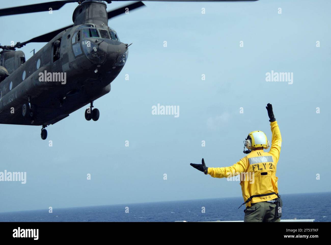 CH-47, Chinook, directing, flight deck, handler, helicopter, helio ...