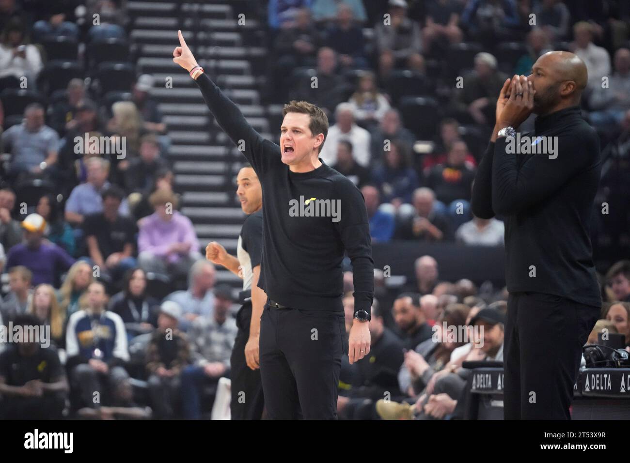 Utah Jazz coach Will Hardy, center, shouts to the team during the first ...